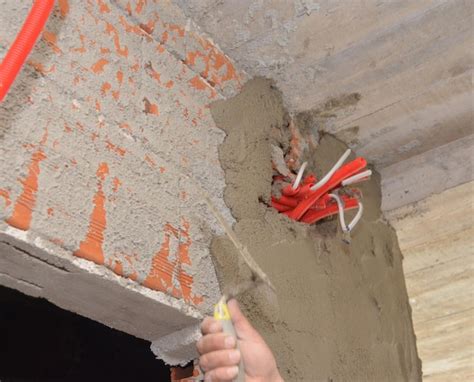 Premium Photo Installing Power Outlets Power Sockets On Initial Stage Of Construction
