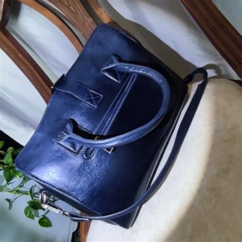 کمدا قیمت و خرید کیف چرم مشکی سایز تصویر رنگ مشکی