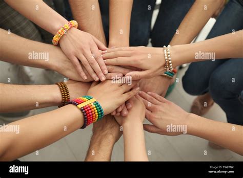 People Putting Hands Together As Symbol Of Unity Stock Photo Alamy
