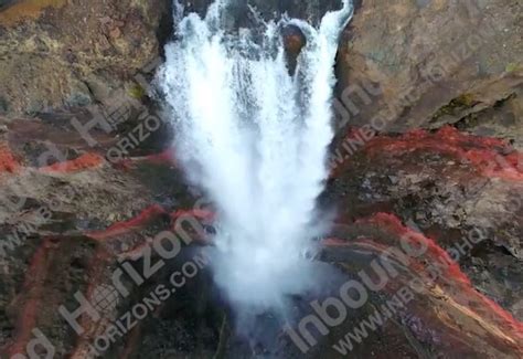 Frothing Waterfall Plunging Over Red Cliffs Inbound Horizons Inc