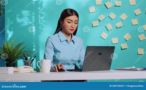 Executive Imputing Data On Laptop Stock Image Image Of Colourful Business
