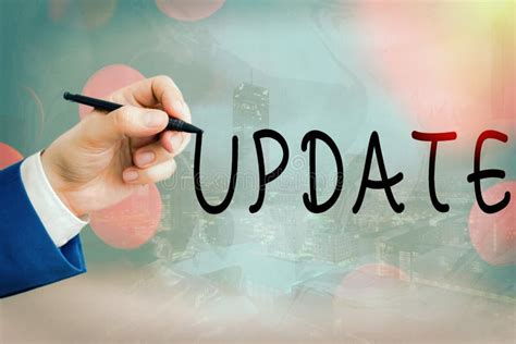 Conceptual Hand Writing Showing Update Business Photo Text By Adding New Information Or Making