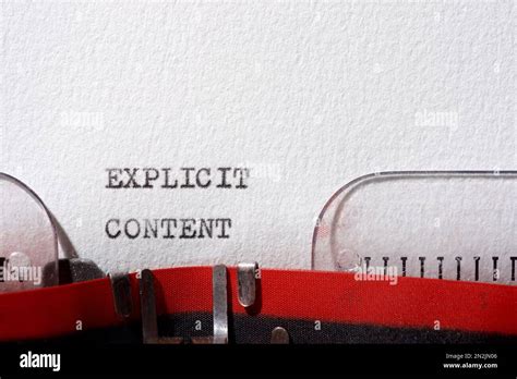 Explicit Content Text Written With A Typewriter Stock Photo Alamy