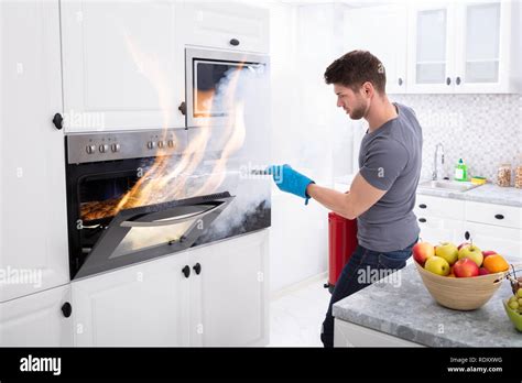 Kitchen fire extinguisher hi-res stock photography and images - Alamy