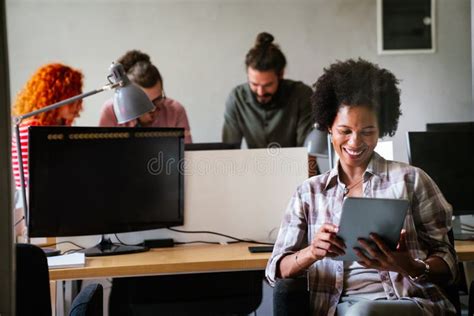 Team Of Programmers Writing Digital Code In The Metaverse And Working Together On The Internet