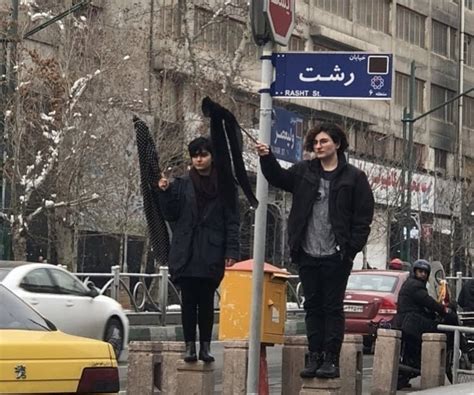 Iranian Women Risk Arrest As They Remove Their Veils For