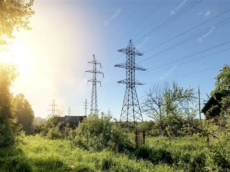 Premium Photo Overhead High Voltage Electrical Transmission Line