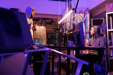 Premium Photo Hackers Working To Hack Computer System