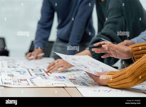 Creative Designer Choosing Color Samples For Mobile Responsive Website Development With Ui Ux