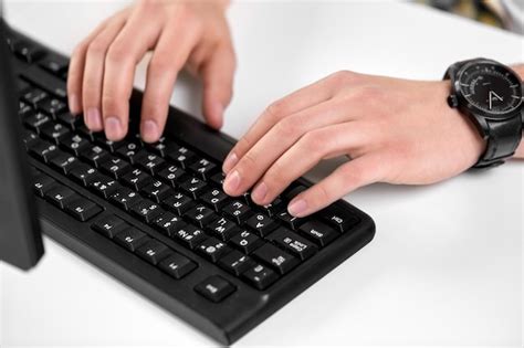 Premium Photo Male Hands Typing On Computer Keyboard On Table