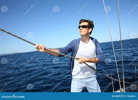 Skipper Navigating The Sailing Boat Stock Image Image Of Water Navigation 64885725
