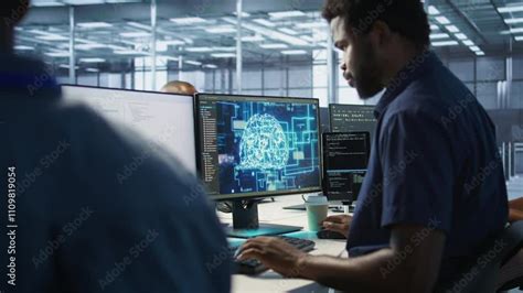 african american worker in data center implements advanced ai driven