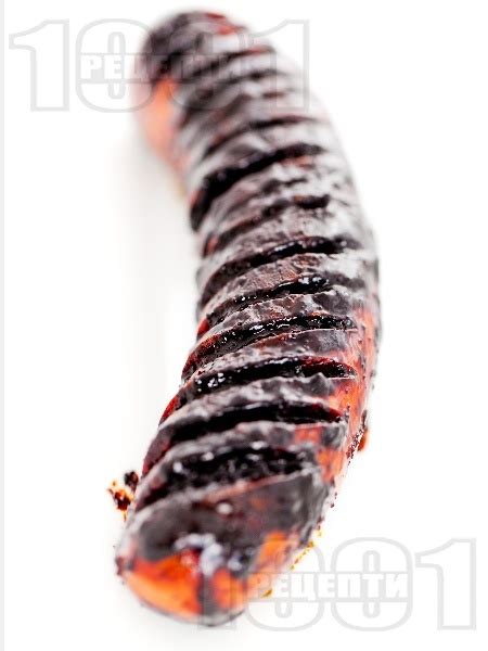 Запечена наденица в соев сос и мед на тиган