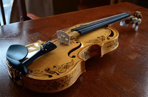 converting a violin to a hardanger fiddle it is finished