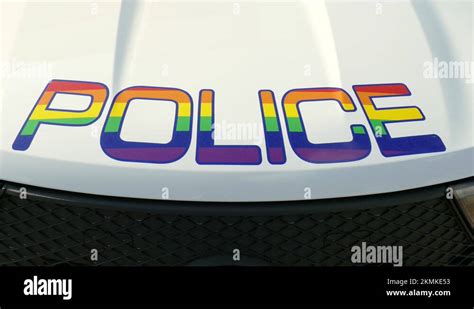 Police Rainbow Pride Flag Text Logo On A Car Front Hood With Textured
