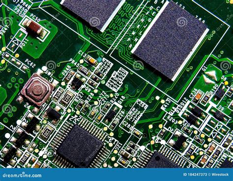 Macro Shot Of An Electronic Circuit Board With Resistors Microchips And Electronic Components