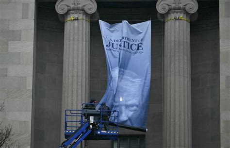 See Huge Trump Banner Installed On Justice Department Hq