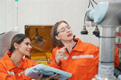 Premium Photo Robotics Control Engineers Solve Problems And Setting