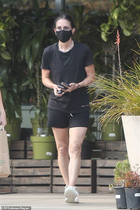 Courteney Cox Showcases Her Legs In Black Shorts While Grocery Shopping