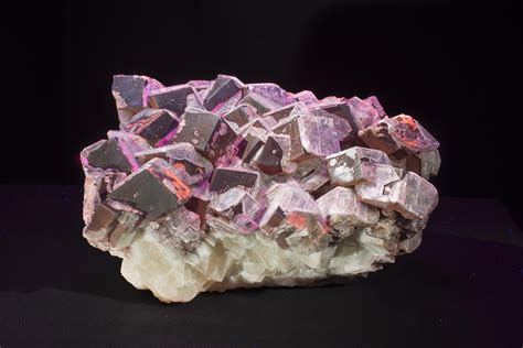Large Calcite Crystals With A Coating Of Hematite Then More Calcite