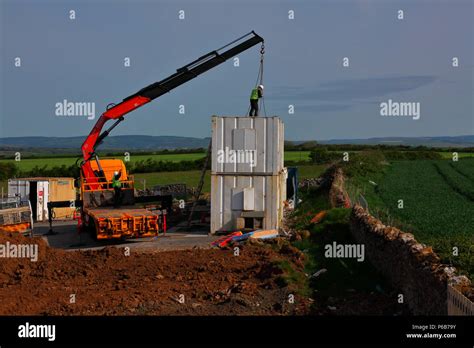 Removal Day And The Container Office Is Chained Up And Hoisted Aboard The Lorry For Transport To
