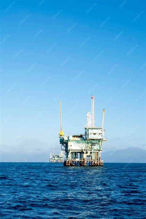Premium Photo An Offshore Oil Platform Rests In Deep Ocean Water On A