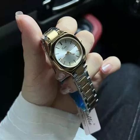 خرید و قیمت ساعت مچی زنانه اورجینال بند استیل رنگ ثابت و ضداب طرح Ap