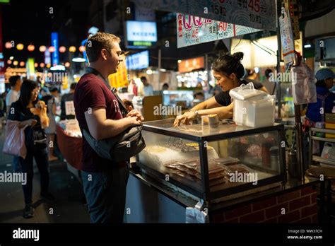 Taipei Taiwan European Tourist Buying Traditional Taiwanese Mochi At