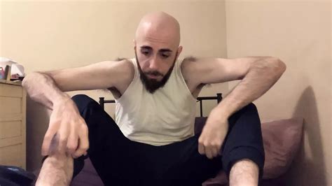 Bald Blue Eyed White Guy With Uncut Dick Strips Down On The Bed To