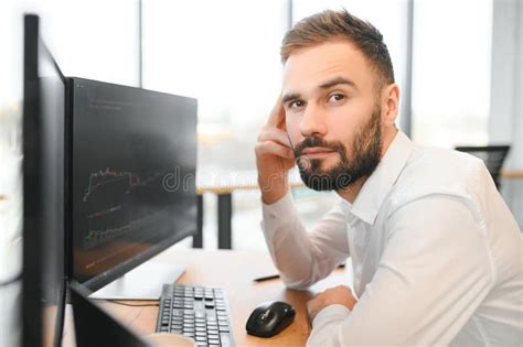 business man looking at the charts of the stock market of