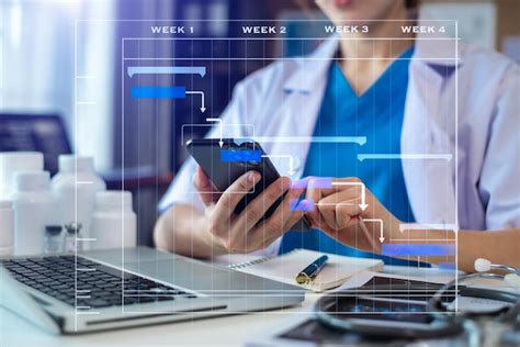 프로젝트 관리자는 Gantt 차트 일정 다이어그램을 사용하여 작업 및 업데이트 작업을 개념으로 작업하는 성공적인 스마트 의사와 협력하는 스마트 의사 프리미엄 사진