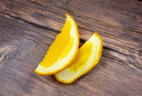 Premium Photo Dry Orange Slicescut Orange Slices On A Wooden Table