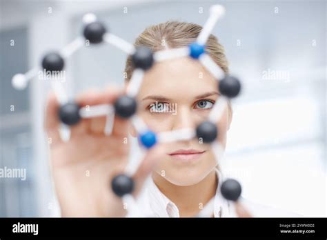 Scientist Laboratory Or Woman With Molecule Structure For Theory Testing Or Behavior Of Atom