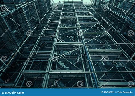 An Architecturally Structured Building With Scaffolding Stock Image