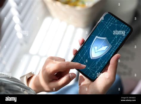 Cyber Security Concept Woman Using Application On Phone Closeup Stock Photo Alamy