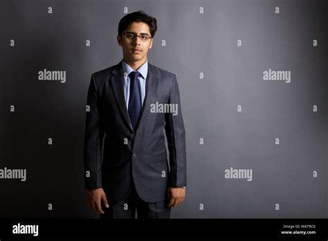 Businessman Standing In Business Suit Stock Photo Alamy