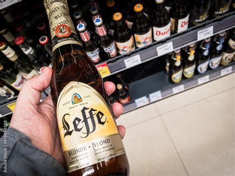 NOVI SAD, SERBIA - FEBRUARY 19, 2021: Leffe Blonde logo on a light beer ...