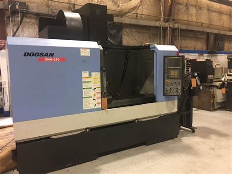2009 Doosan Dnm 650 Vertical Machining Center W4th Axis Tramar