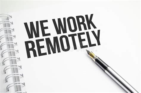 We Work Remotely Words On White Notebook And Pen Stock Image Image Of