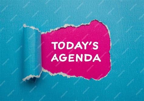 premium photo todays agenda words written on blue torn paper with