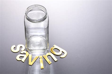 Premium Photo Empty Saving Jar With Alphabets Saving