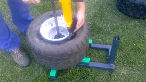 DIY build manual Tire Changer changing quad rear tires - YouTube