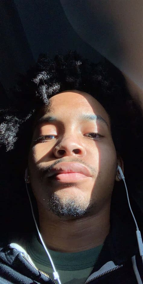 Download Young Man Shadowed Portrait Sunlight Wallpaper