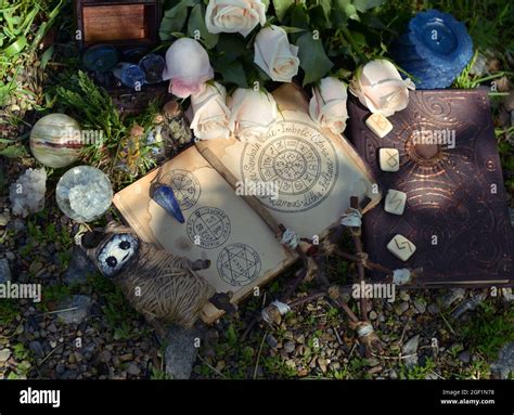 Wicca Ritual With Open Witch Diary Pentagram And Voodoo Doll On The