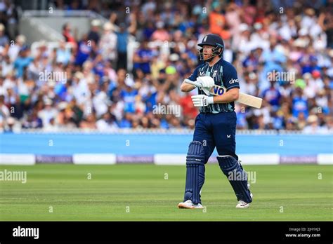 Jonny Bairstow of England leaves the field after he is bowled by Yuzvendra Chahal of India Stock ...