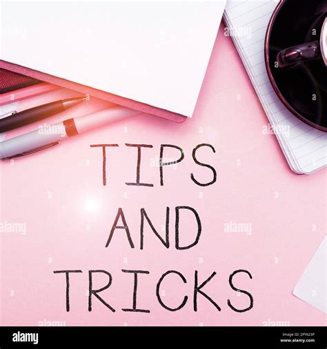 Hand Writing Sign Tips And Tricks Word Written On Helpful Advices That Makes Certain Action