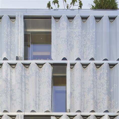 Moussafir Architectes Retrofits Paris Office With Movable PVC Curtains