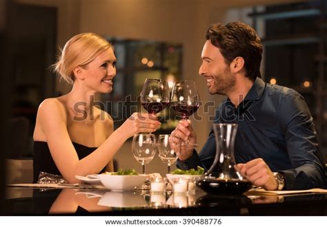 Happy Couple In Love Having Romantic Dinner In Luxury Gourmet