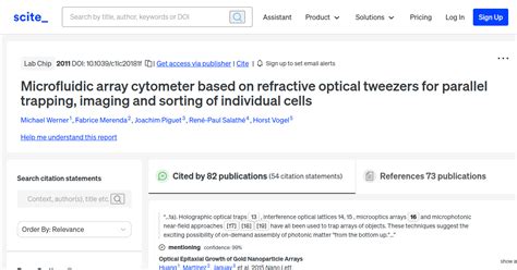 Microfluidic Array Cytometer Based On Refractive Optical Tweezers For