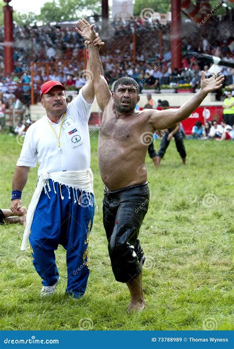 A Wrestler Is Awarded Victory At The Kirkpinar Turkish Oil Wrestling